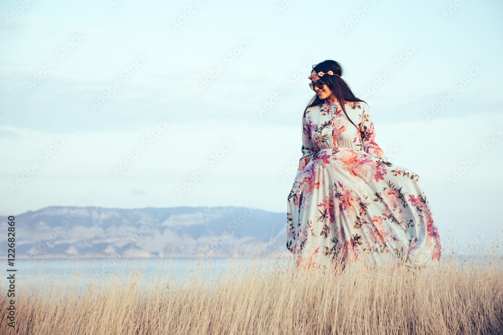 Plus size model in floral dress Stock Photo | Adobe Stock