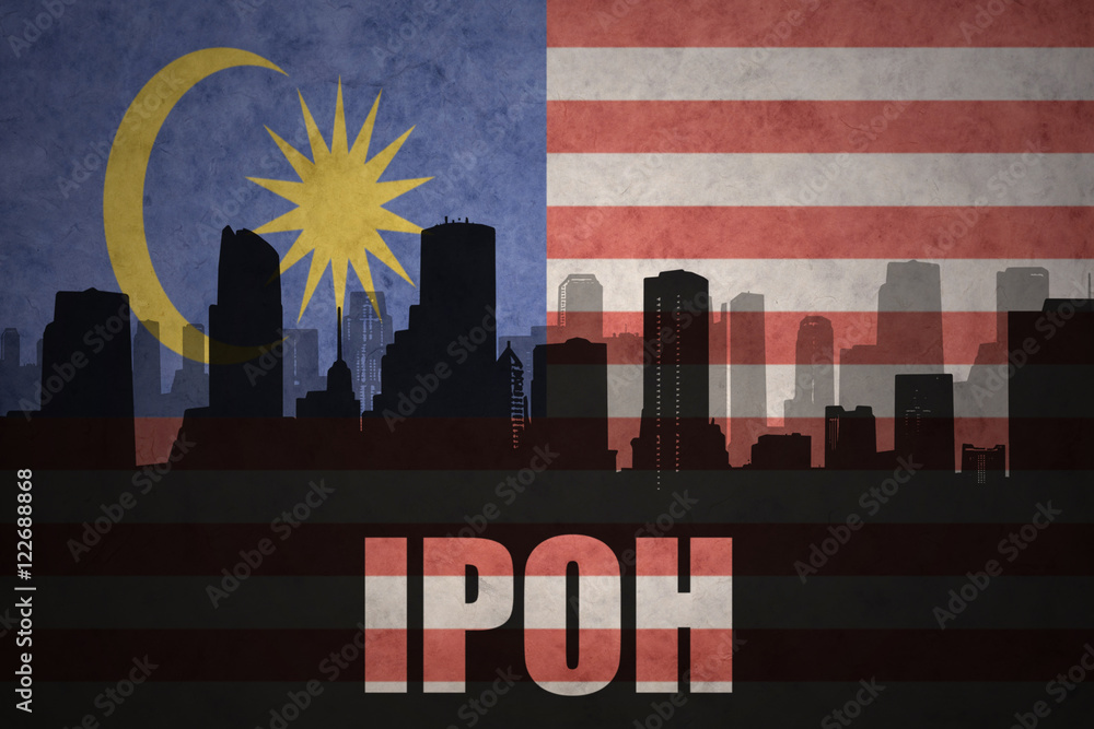 abstract silhouette of the city with text Ipoh at the vintage malaysian ...