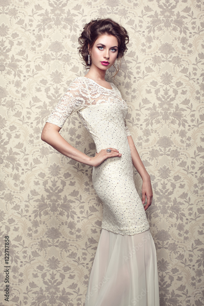 Fashion portrait of beautiful woman in elegant dress. Girl with elegant ...