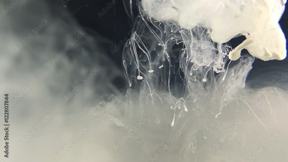 White Ink Effect In Water Filmed On Black Background. Abstract ink ...