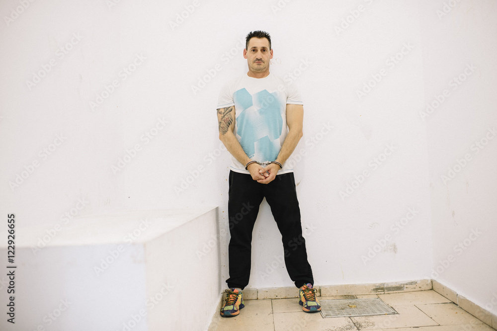 Caucasian Prisoner behind bars in Jail - Criminal Justice syste Stock ...