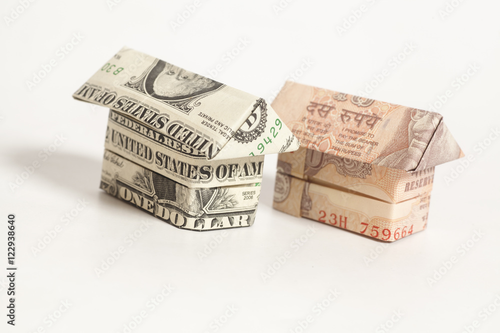 Origami house made of 1 dollar and Indian rupee banknotes Stock Photo ...