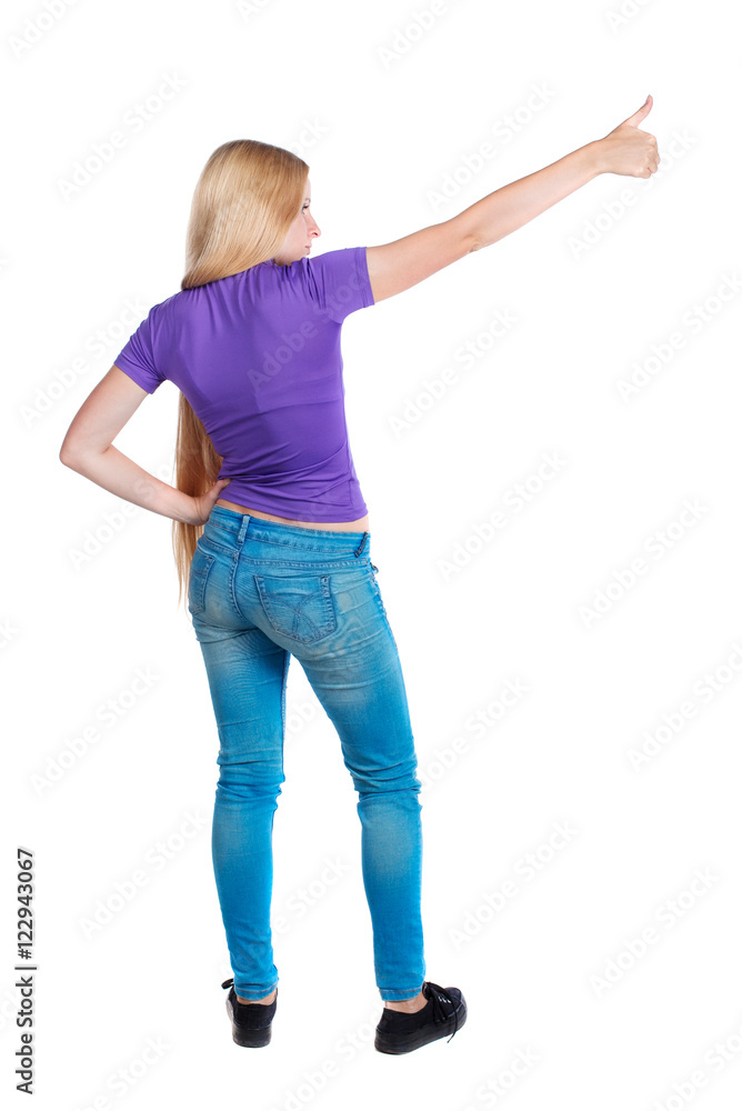 Back view of pointing woman. beautiful girl. Rear view people ...