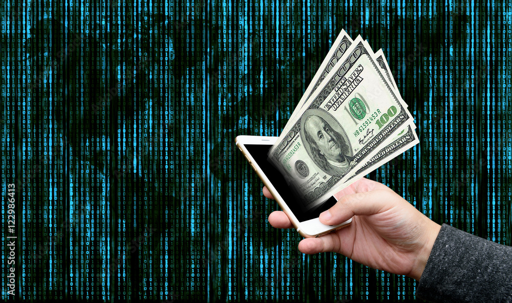 Cyptocurrency or digital money concept image. Hand holding smartphone ...