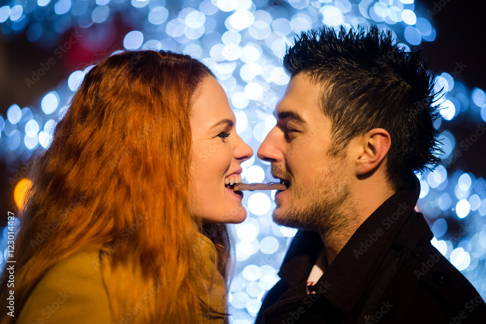 Sweet love - couple eating chocolate together Stock Photo | Adobe Stock