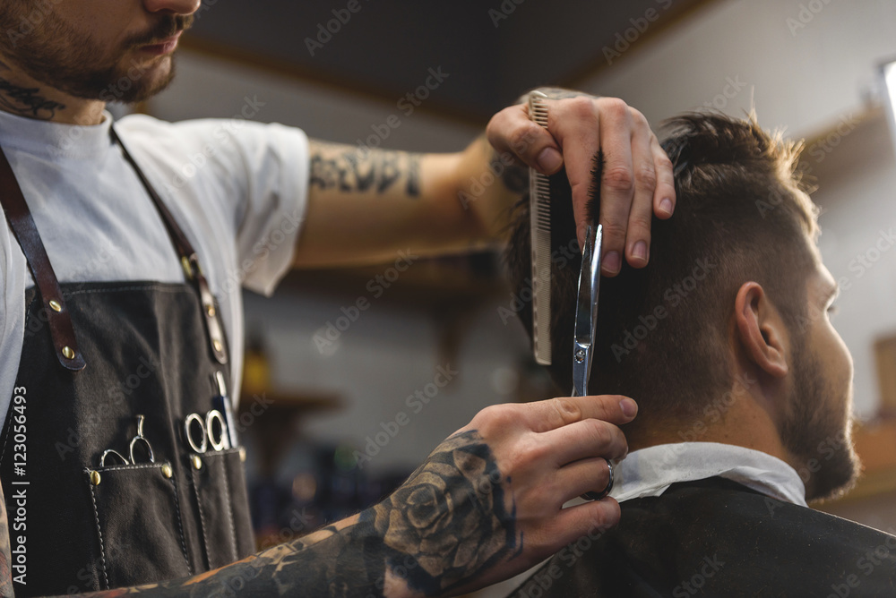 barber with scissors at work Stock Photo | Adobe Stock