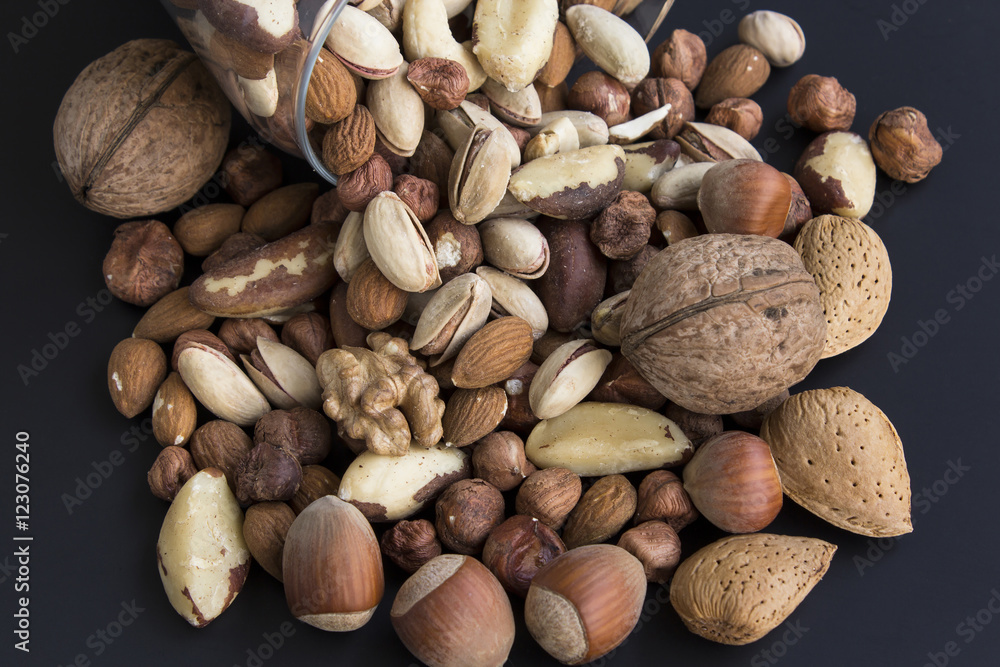 Nuts Mix on a Black Background Stock Photo | Adobe Stock