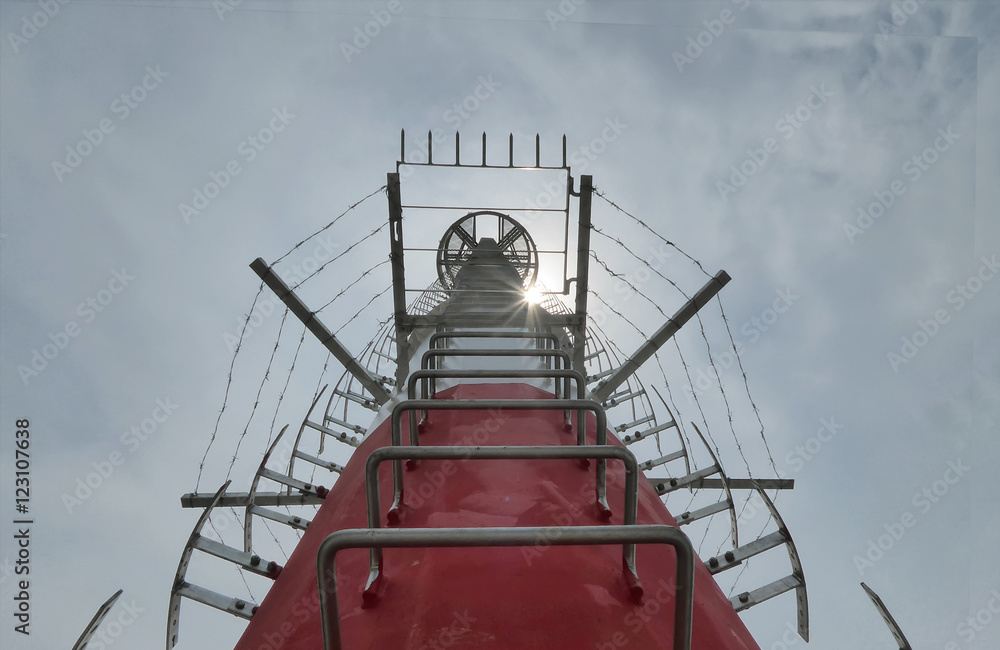 View of new constructed telecommunication tower or monopole with red ...