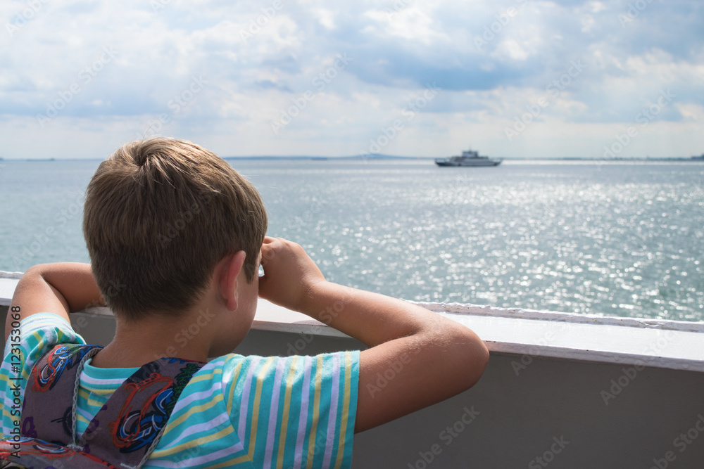 Boy pretends that looking through binoculars Stock Photo | Adobe Stock