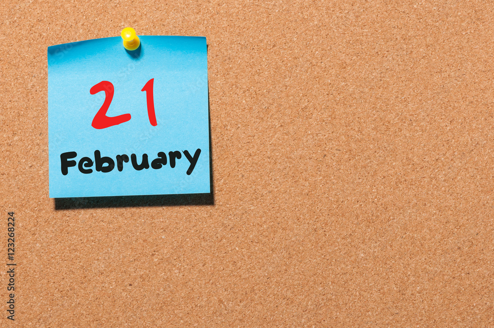 February 21st. Day 21 of month, calendar on cork notice board ...