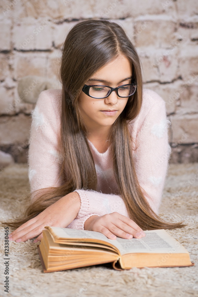 Beautiful girl reading book. Soft photo of girl with old book ...