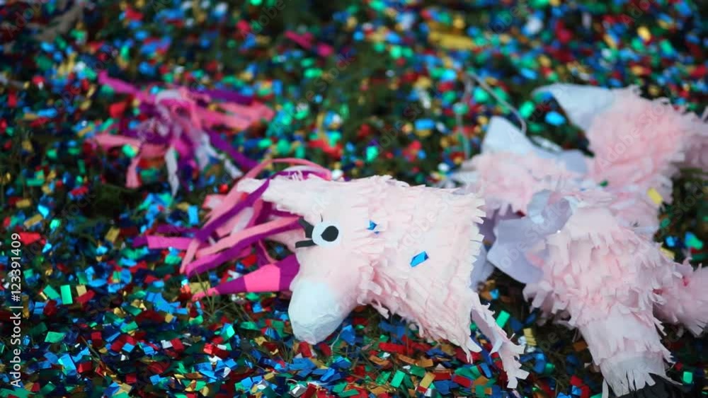 Broken pinata in the form of a horse lying on the grass. Stock Video ...