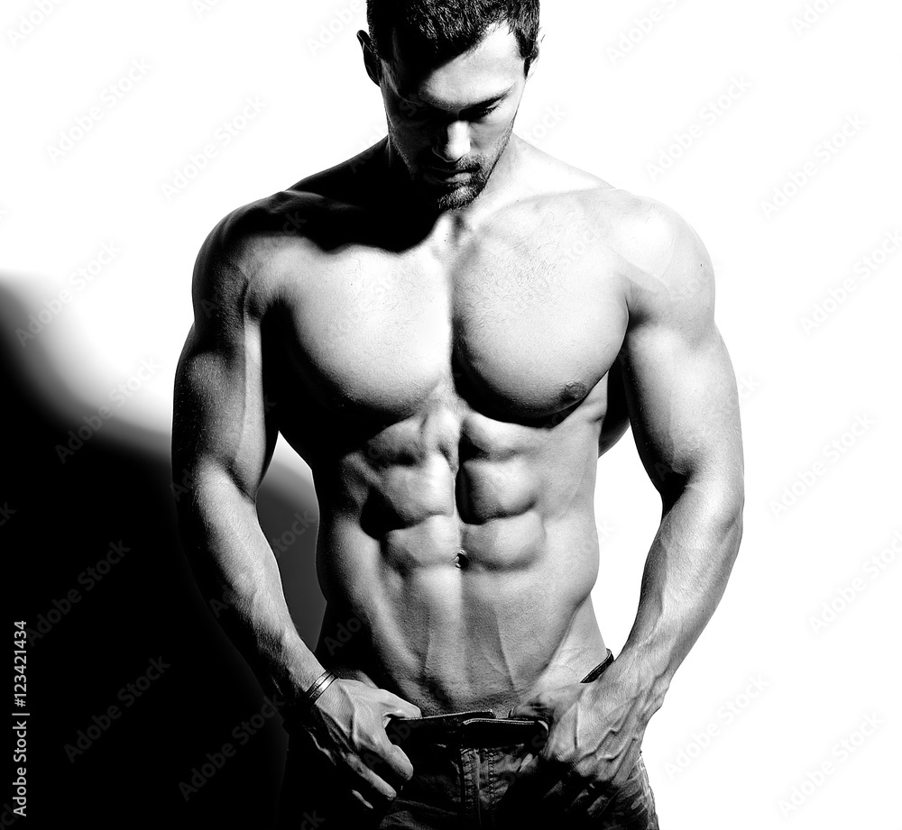 Portrait of strong healthy handsome Athletic Man Fitness Model posing ...