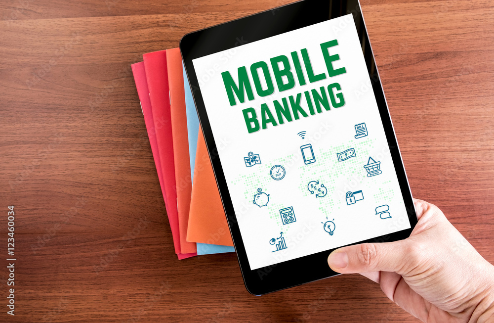 Top view of hand holding tablet with Internet banking word over Stock ...
