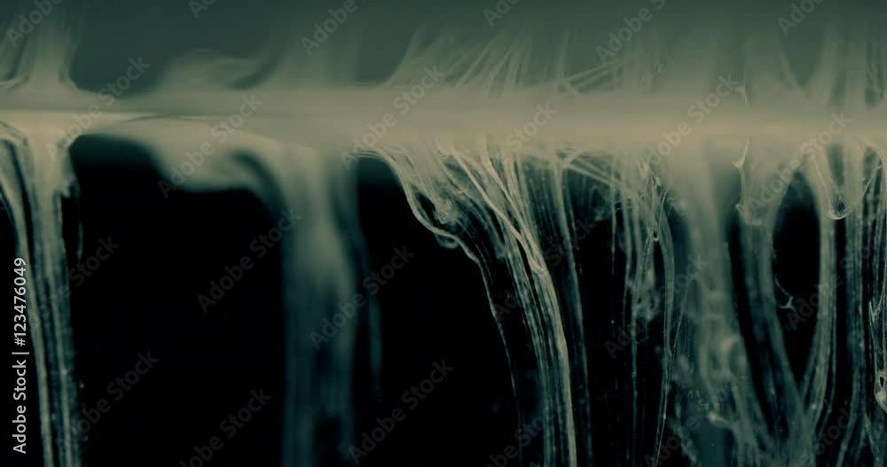 White Ink Effect In Water Filmed On Black Background. Abstract ink ...