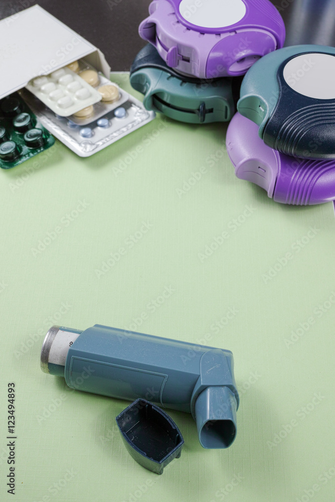 Asthma, allergy, illness relief concept, salbutamol inhalers and pills ...