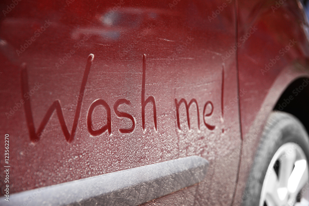 Written text WASH ME on dirty car Stock Photo | Adobe Stock