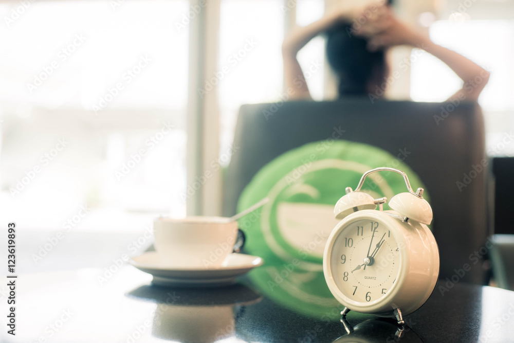 Time of waiting with clock and coffee. Stock Photo | Adobe Stock