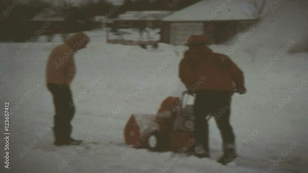 clearing snow after a blizzard with snowblower Stock Video | Adobe Stock