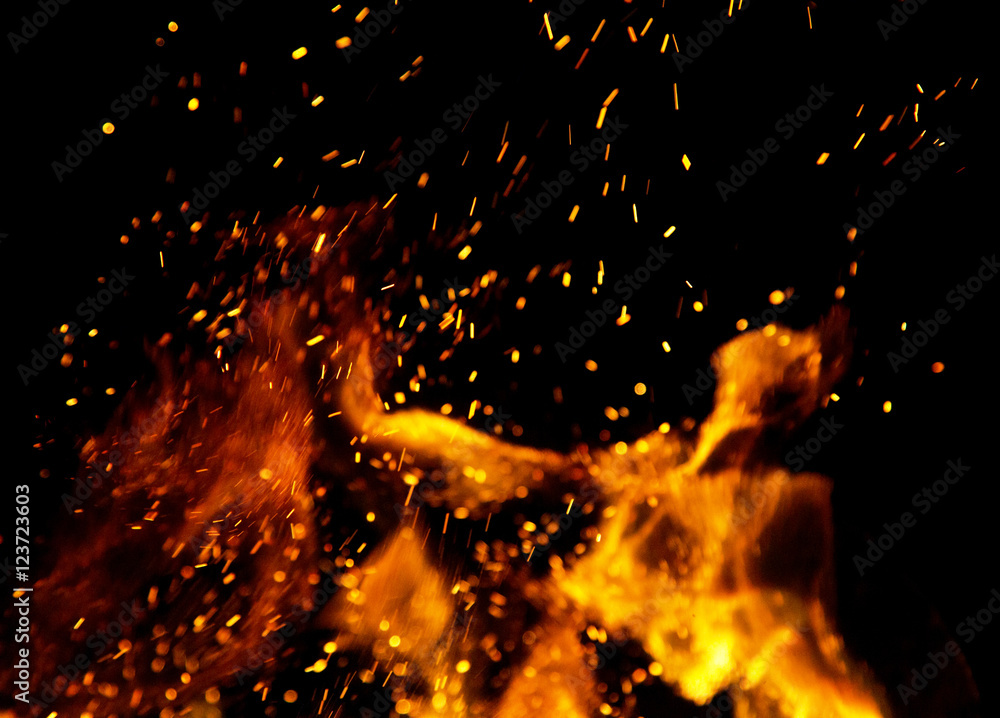 fire flames with sparks on a black background Stock Photo | Adobe Stock