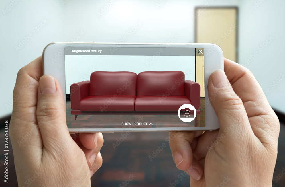 Augmented reality marketing technology concept. Hand holding smart ...