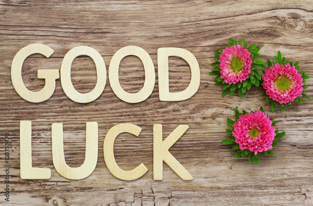 Good luck written with wooden letters and pink daisies Stock Photo ...
