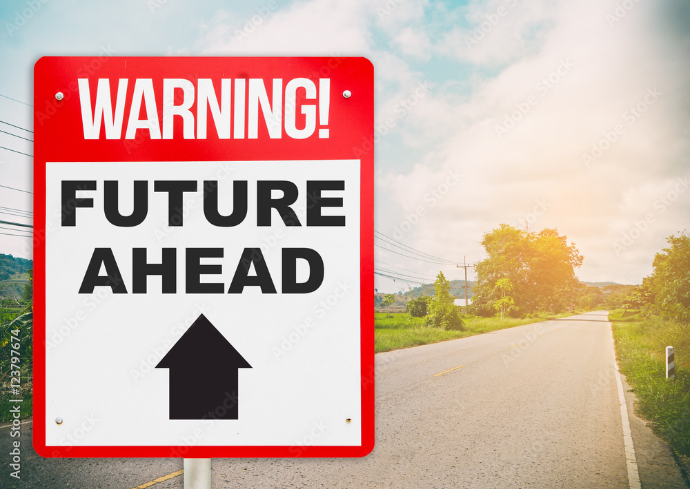 Warning sign with Future Ahead on a bright road. Stock Photo | Adobe Stock