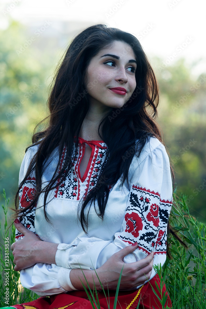 Beautiful young Ukrainian girl in national costume. Girl with beautiful ...
