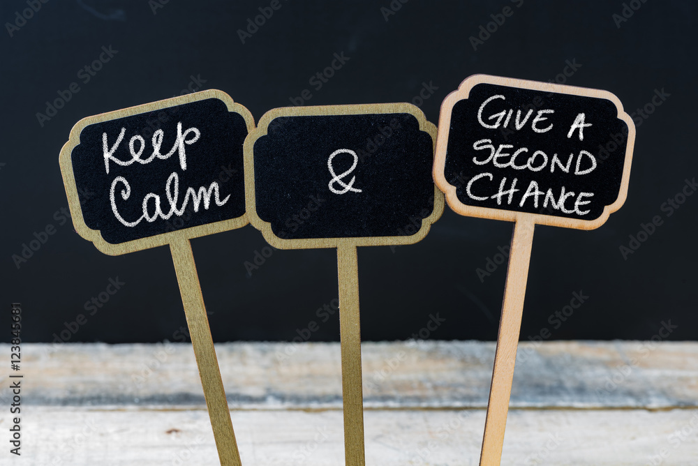 Keep Calm and Give A Second Chance message written with chalk on mini ...