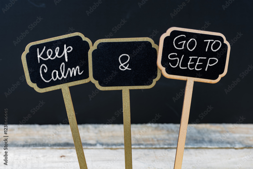 Keep Calm and Go To Sleep message written with chalk on mini blackboard ...