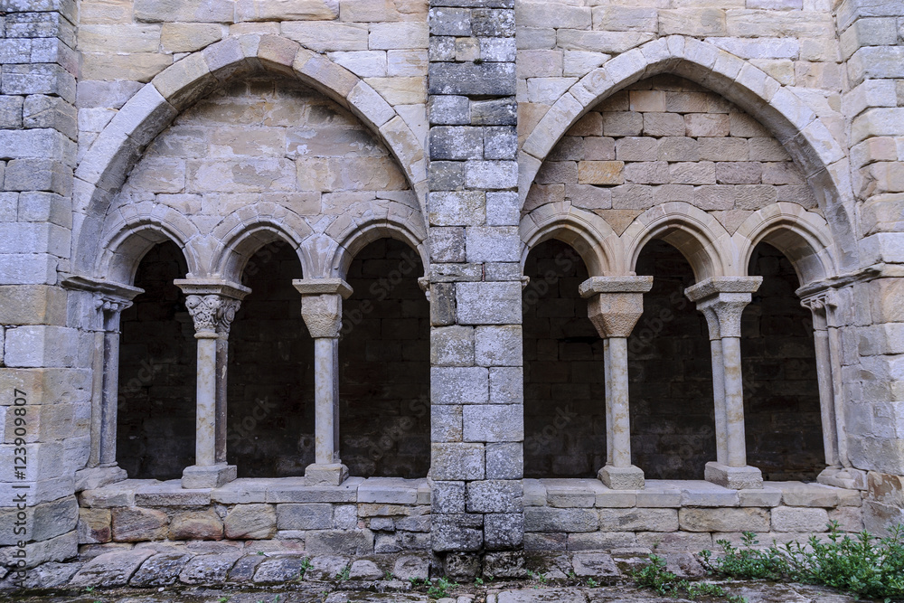sight of the columns, arches and capitals of the courtyard of the ...