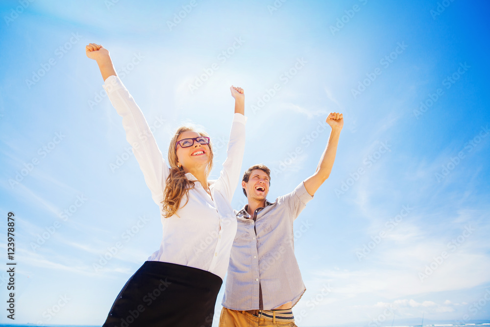 successful people celebrating victory with their hands risen Stock ...