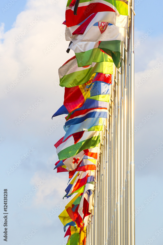 different countries flags on flagpoles on the sky background Stock ...