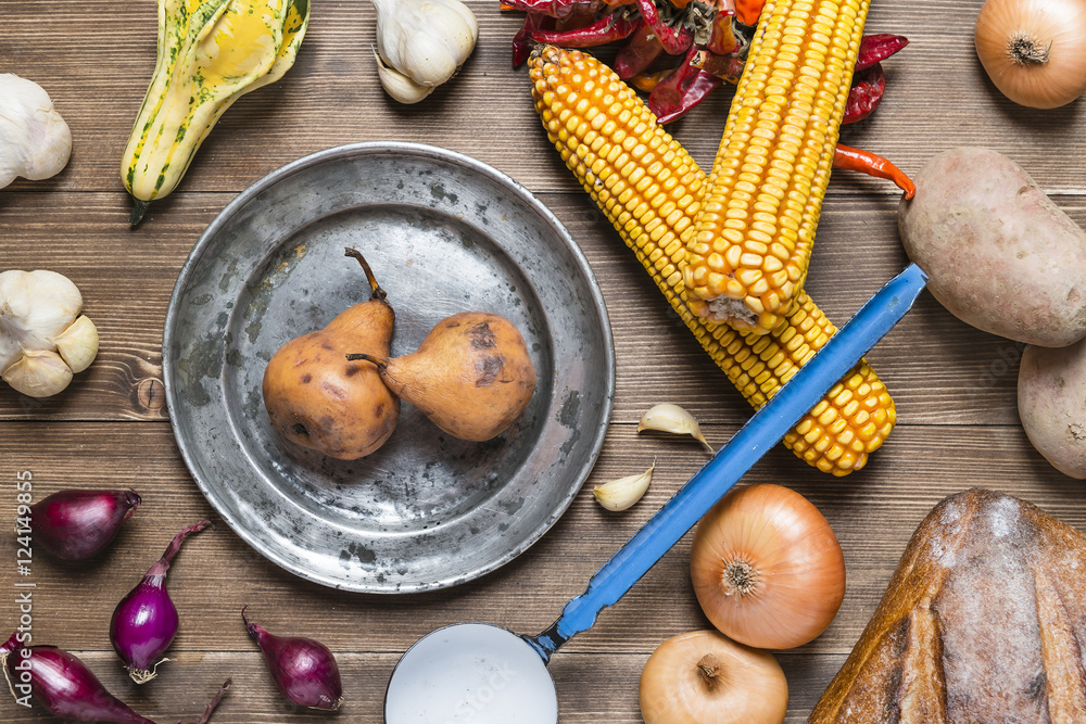 Natural looking food background with old style peaches,dried corns and ...