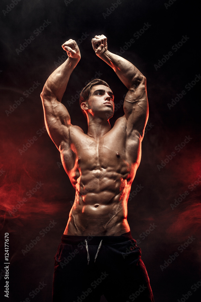 Strong Man Bodybuilder with Six Pack and perfect abs, shoulders, biceps ...