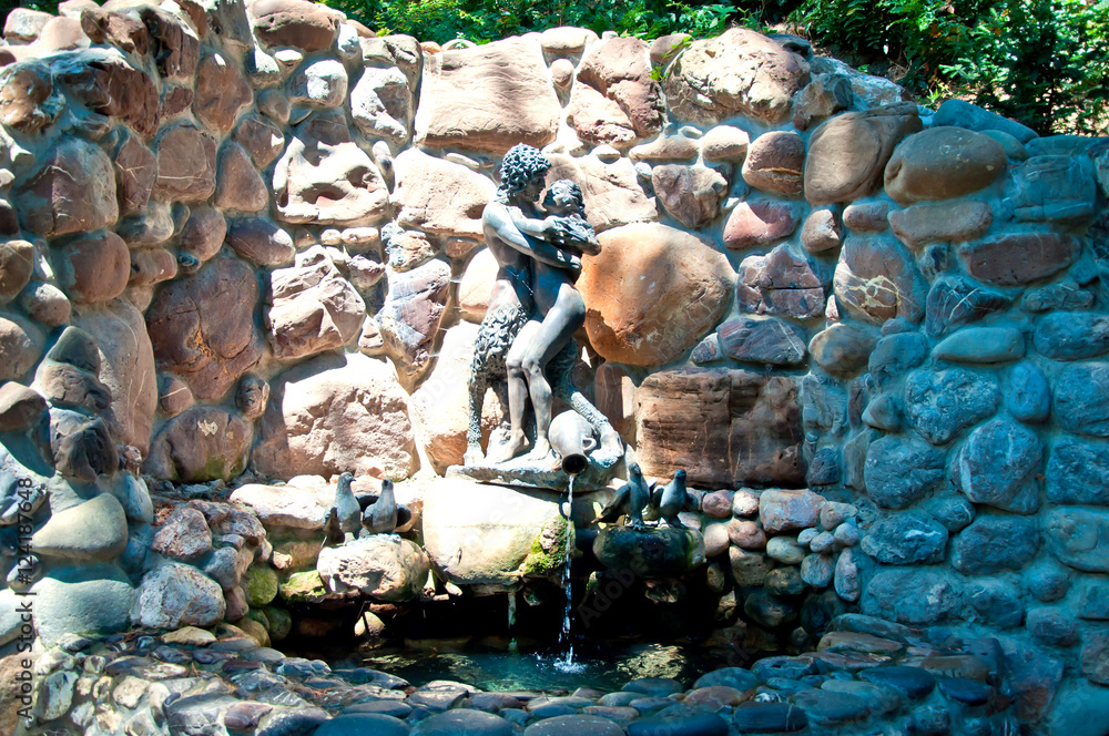 Statues by the water that adorn the park. Stock Photo | Adobe Stock