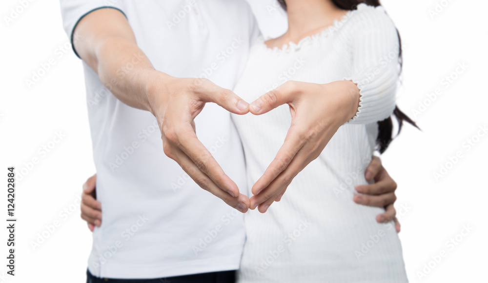 Attractive Asian Couple making a love symbol with hands. Focus on hands ...