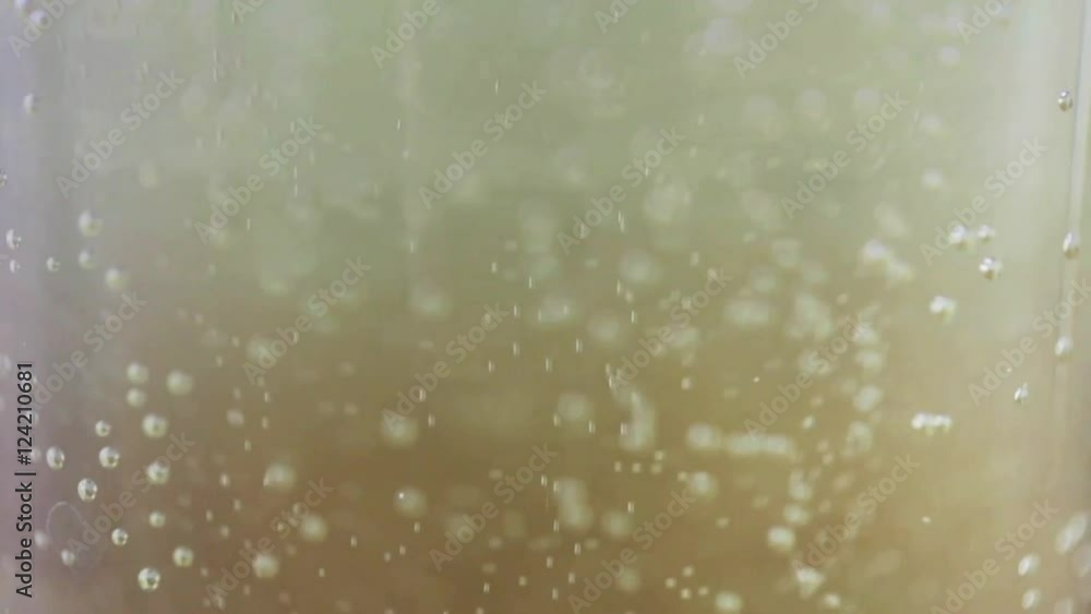 fizzy drink or bubbles floating up in water Stock Video | Adobe Stock