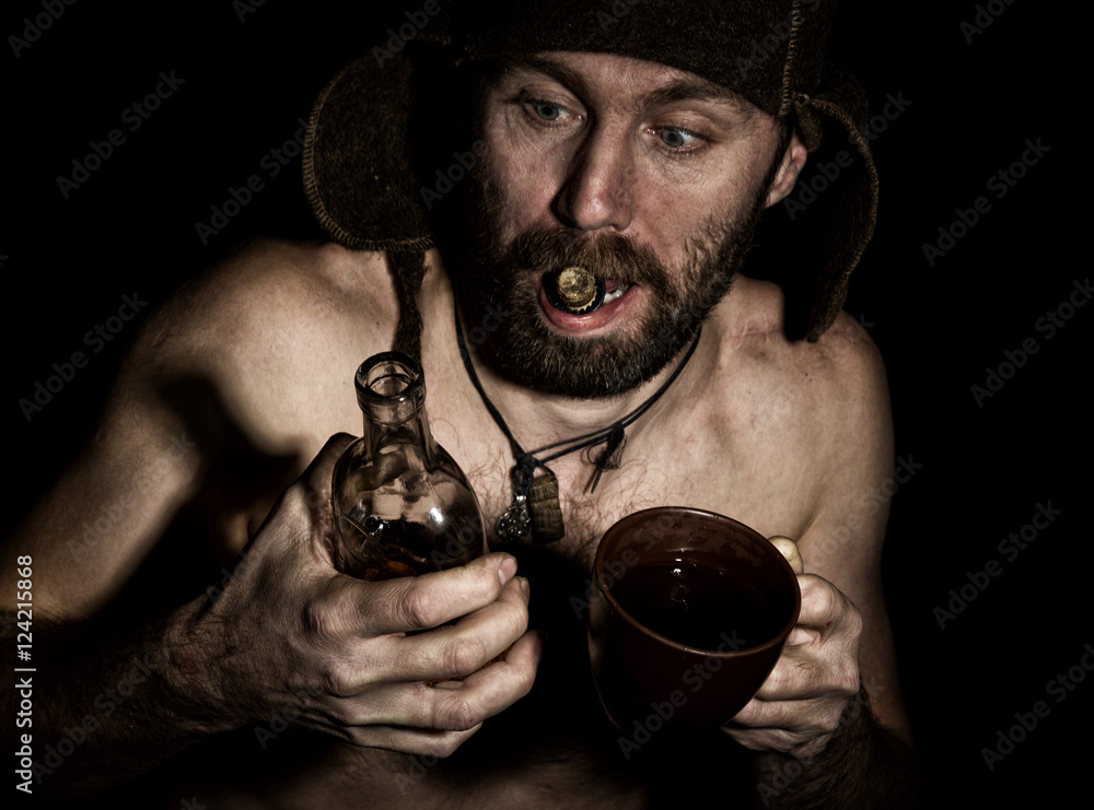 Dark portrait of scary evil sinister bearded man with smirk, he opens a ...