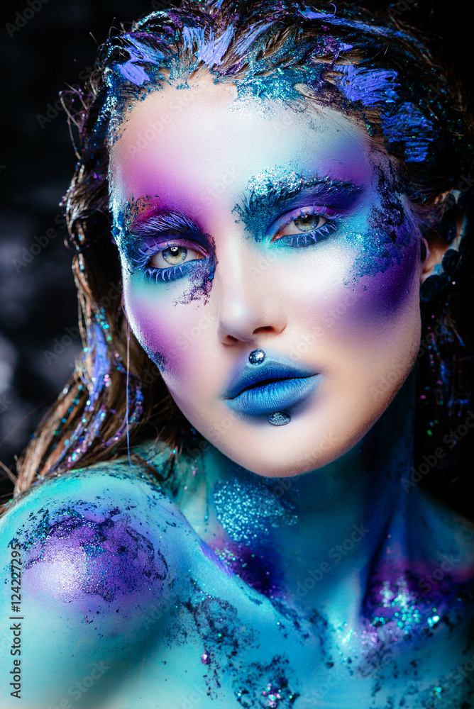 Portrait of a beautiful mermaid girl. Wet skin, wet hair, glitter and ...