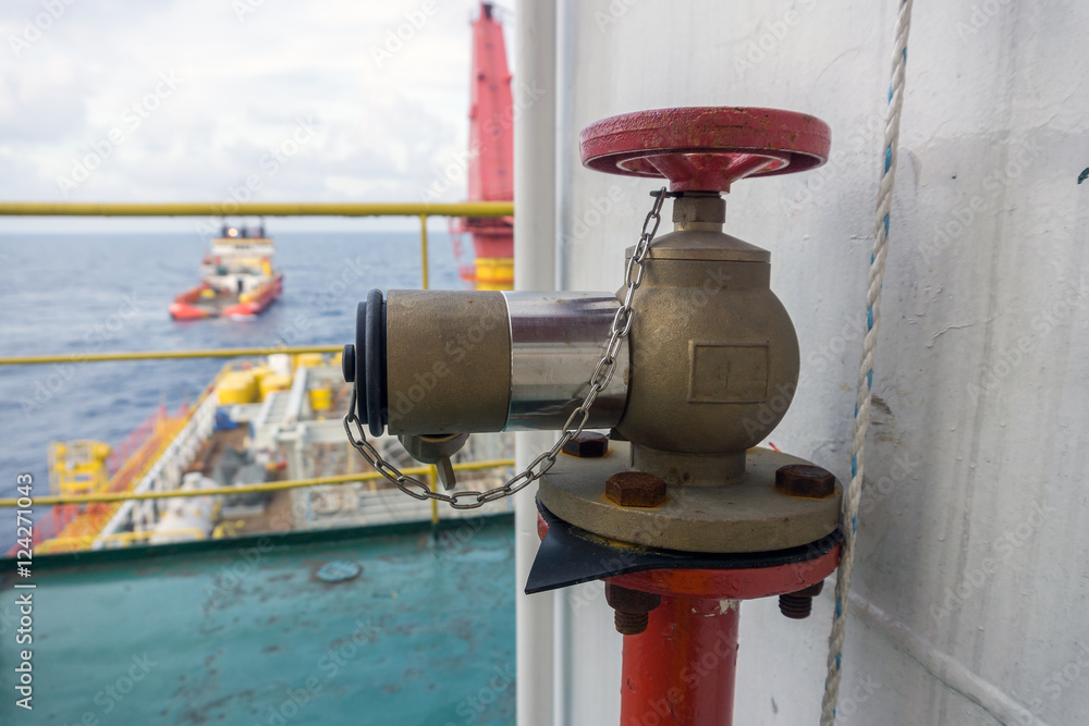 Valve of the fire hydrant piping system on board construction barge at ...