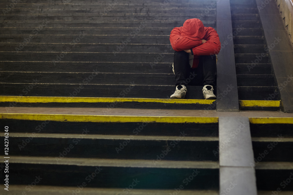 young homeless man sleeping on the street Stock Photo | Adobe Stock