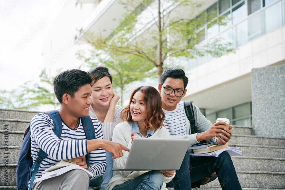 Students with laptop Stock Photo | Adobe Stock