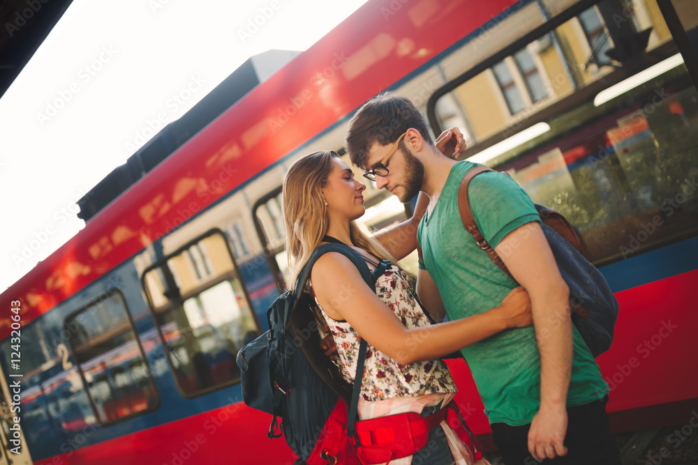 Beautiful couple hugging after long journey Stock Photo | Adobe Stock