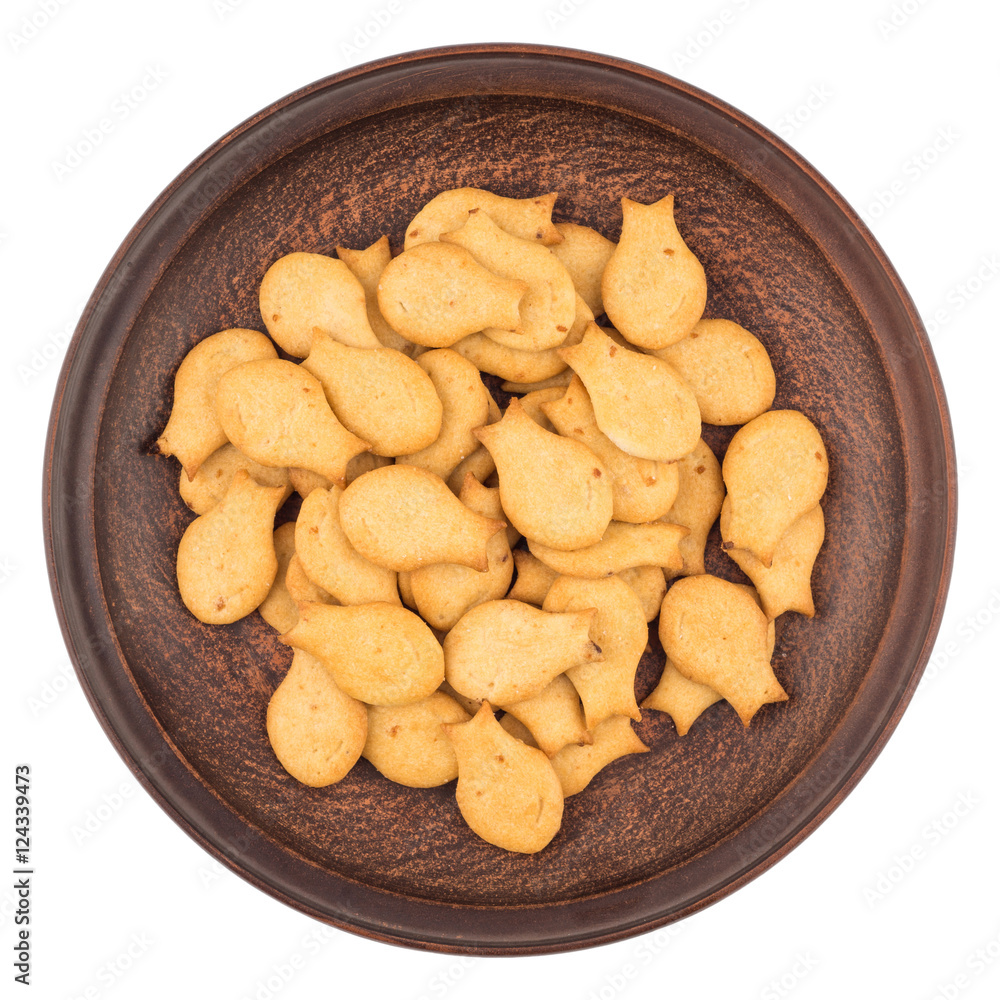 Goldfish Crackers in brown plate. Isolated on white background. Stock ...