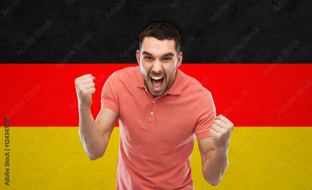 angry man showing fists over german flag Stock Photo | Adobe Stock