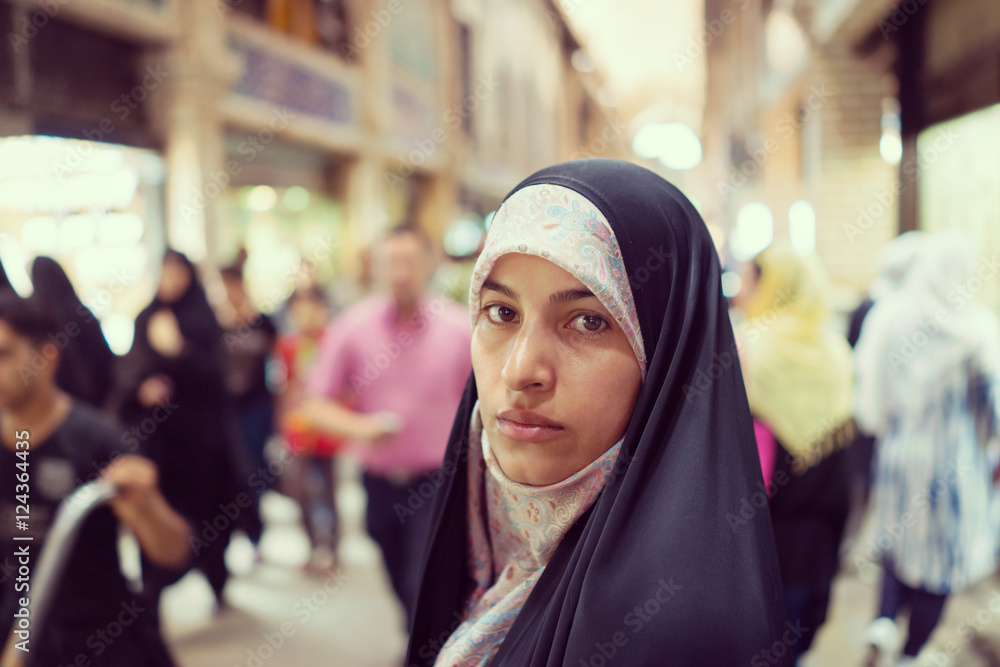 Beautiful Muslim woman spending time on traditional Iranian baza Stock ...