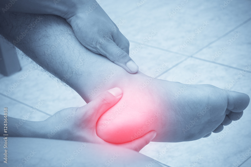 Asian man with foot Ankle Pain and feeling bad,color filter Stock Photo ...