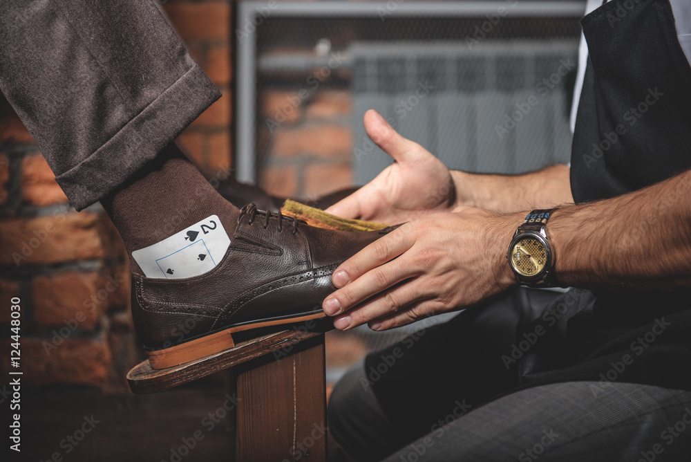 side view of shoe shine process Stock Photo | Adobe Stock