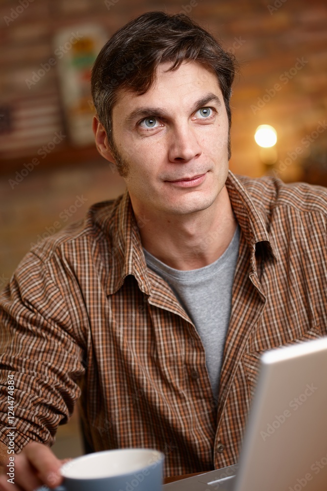 Foto Stock Portrait of daydreaming man | Adobe Stock